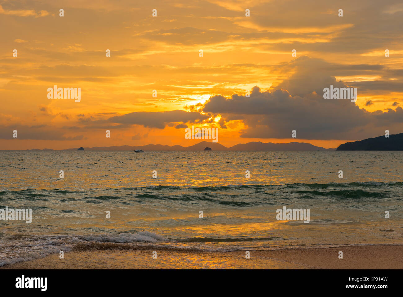 bright orange sunset with beautiful clouds over the sea of Thailand ...