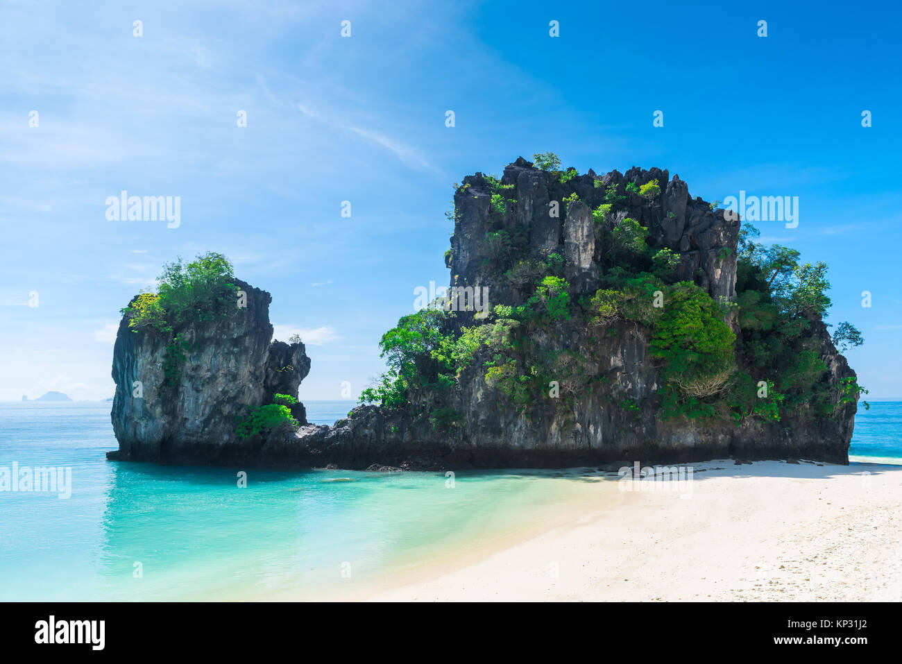two cliffs in the Andaman Sea near the beach of the island of Hong ...
