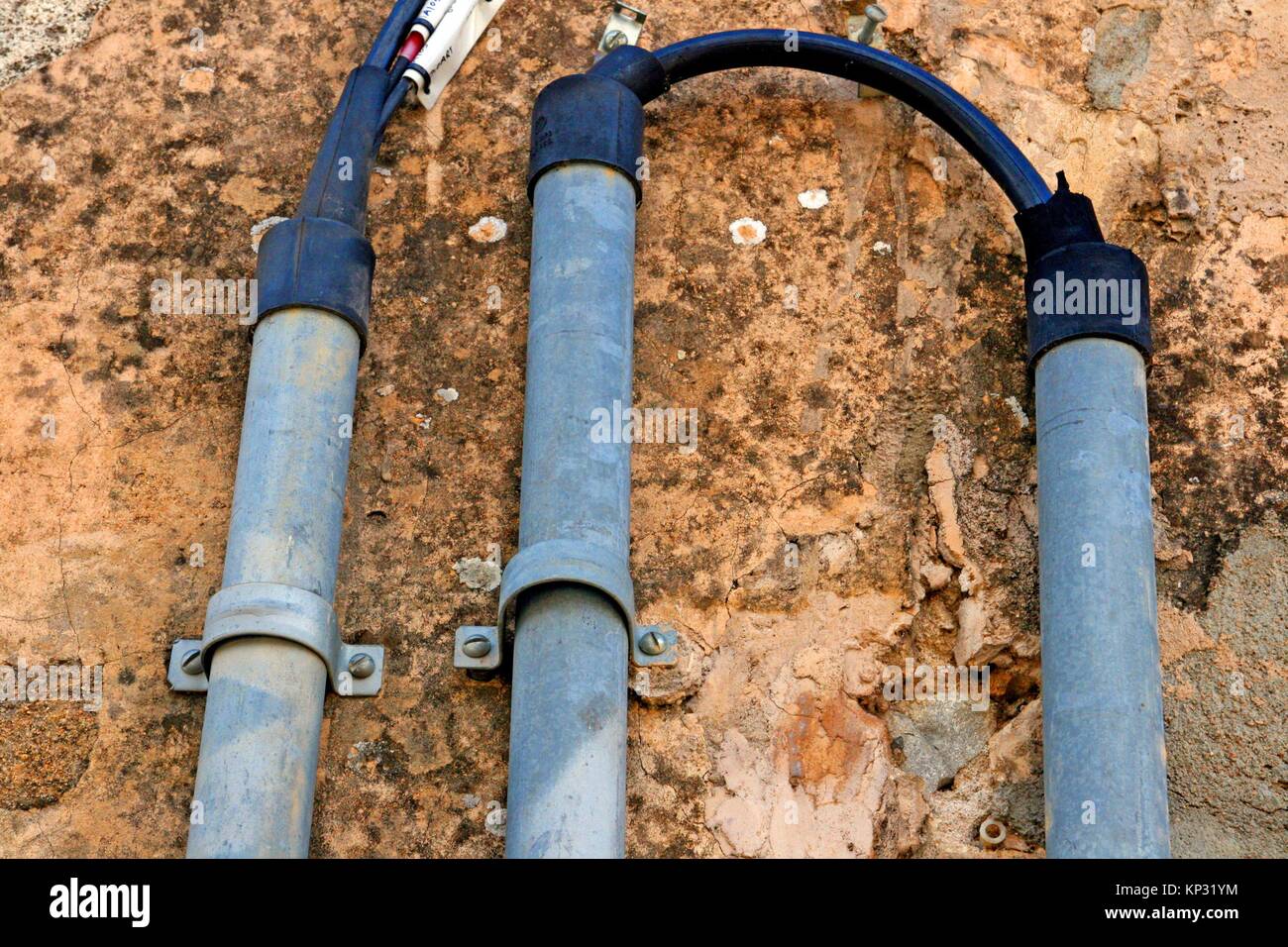 Power wires and pipes Stock Photo - Alamy