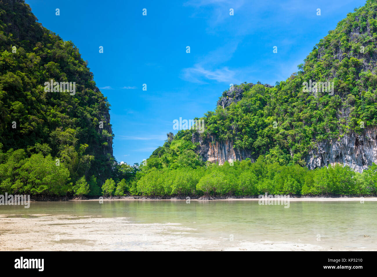 a shallow sea bay at low tide in a beautiful tropical place in Thailand ...