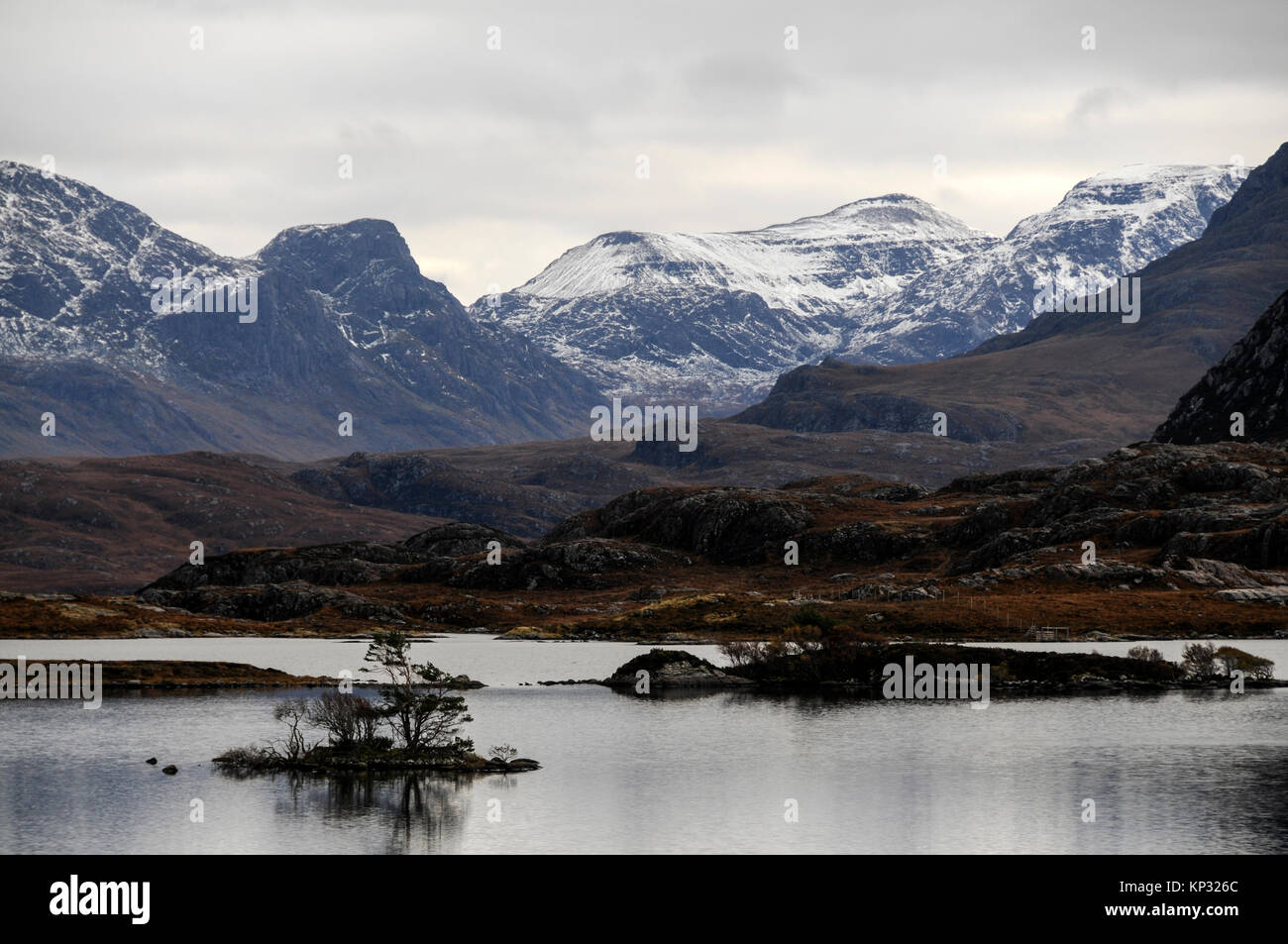 Snow-capped mountains and Loch Ewe near Poolewe in Wester-Ross ...