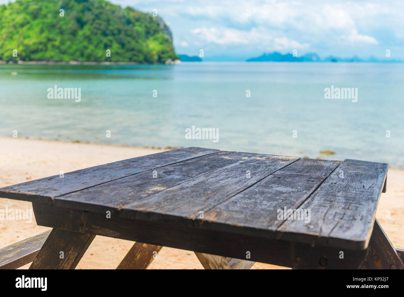 old wooden worktops against the sea to insert objects Stock Photo - Alamy