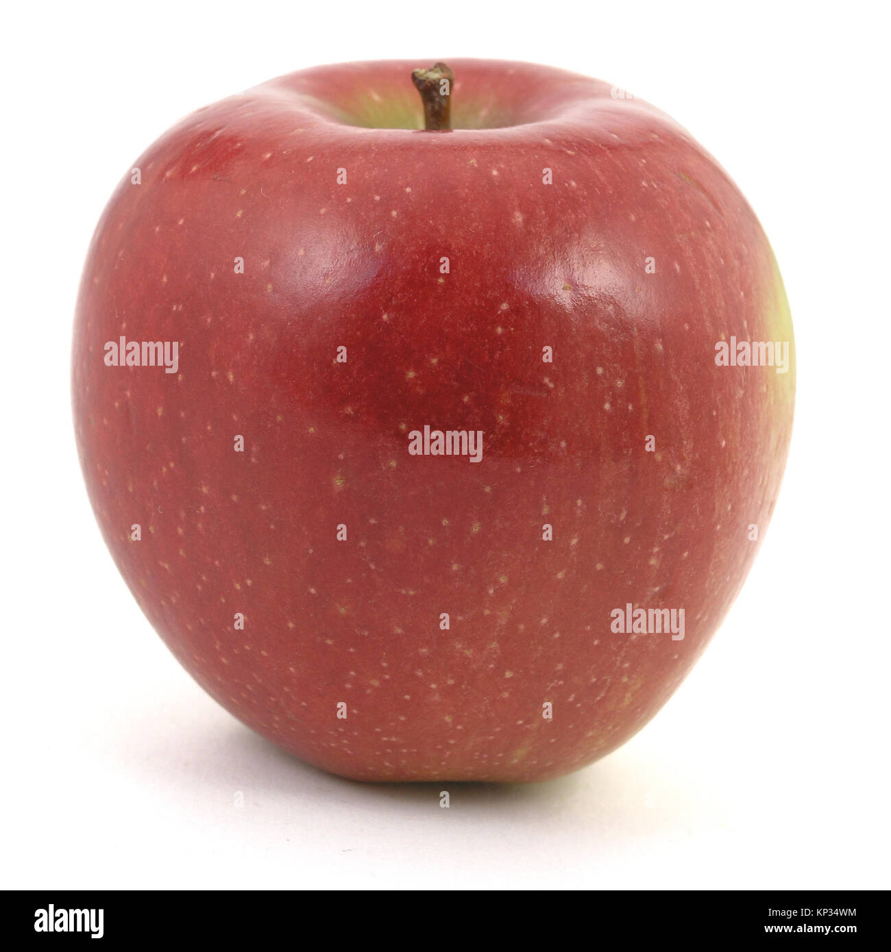 One red apple on white tablr Stock Photo - Alamy