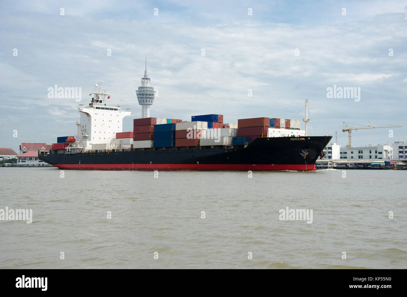 Cargo container ship sailing in the river Stock Photo - Alamy