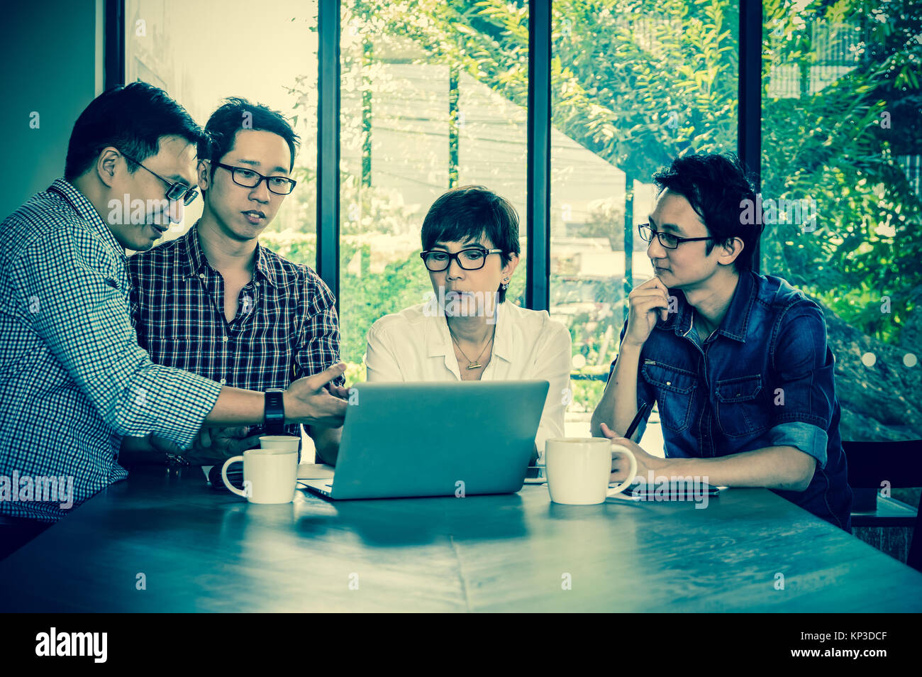 Group of Asian Business People with casual suit are meeting in the ...