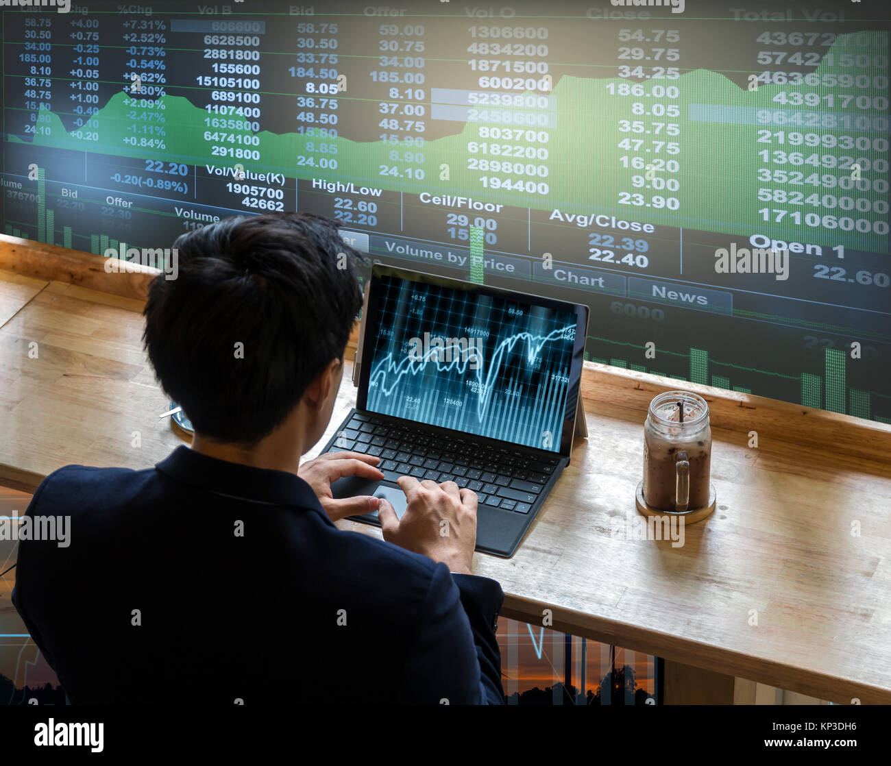 Back side of Businessman sitting and using computer laptop showing ...