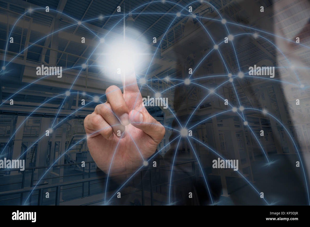 Businessman pointing with digital network line and circles over factory ...