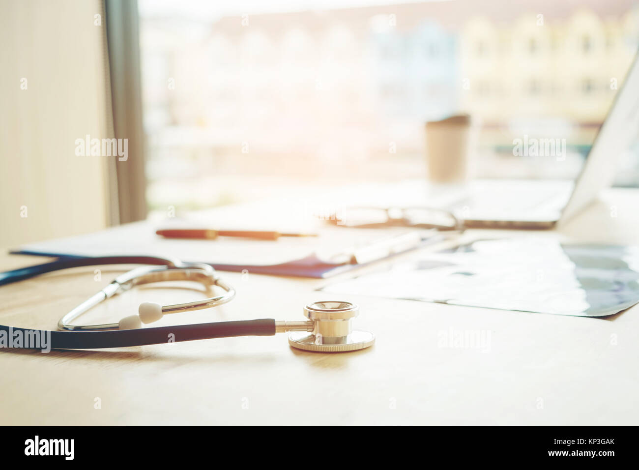 Stethoscope on table in office Doctor Hospital office Stock Photo - Alamy