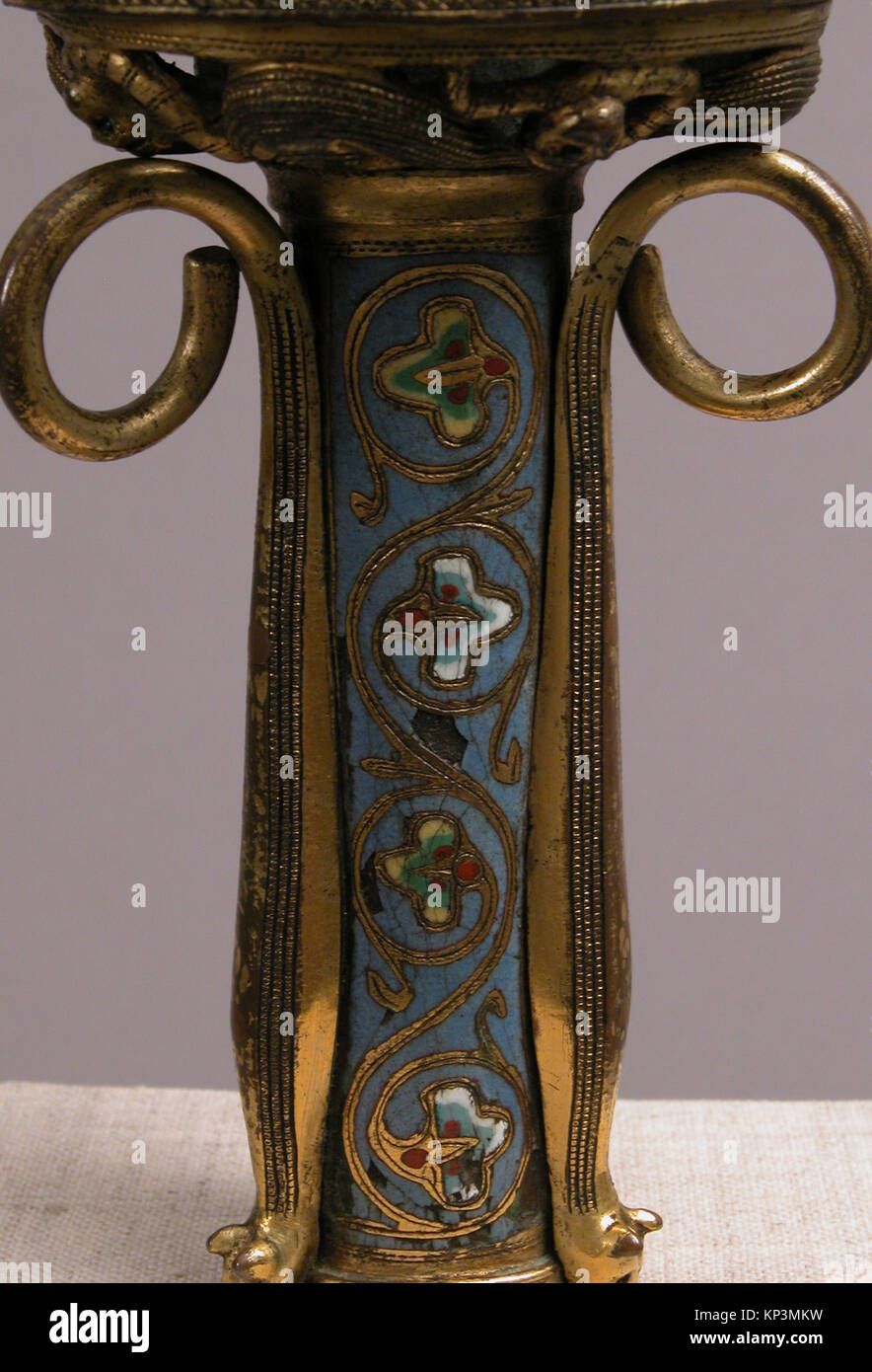 This crozier head depicts Saint Michael slaying the dragon ...
