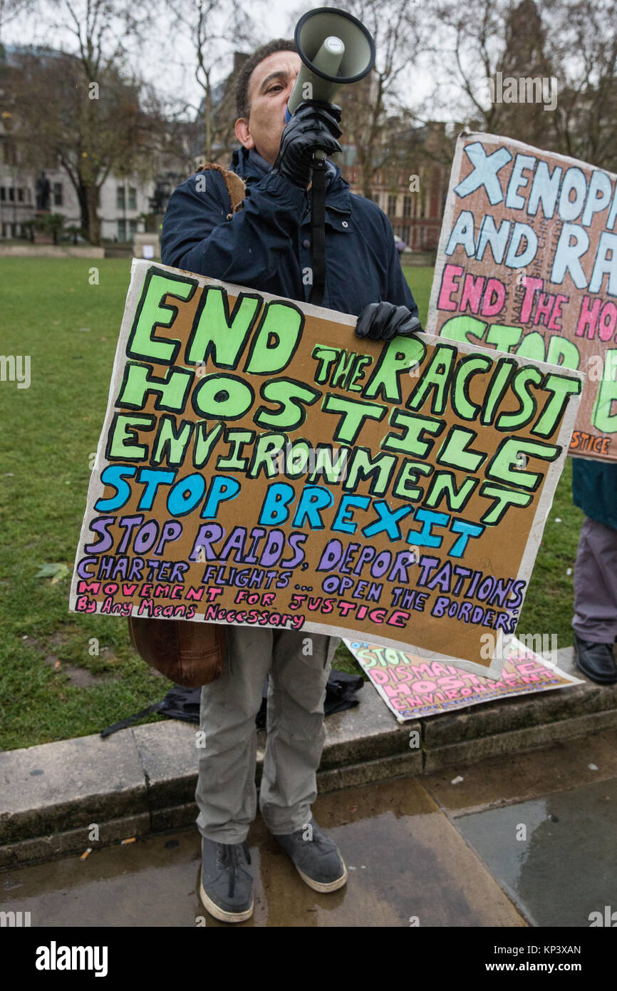 London, UK. 13th December, 2017. An activist from Movement for Justice ...