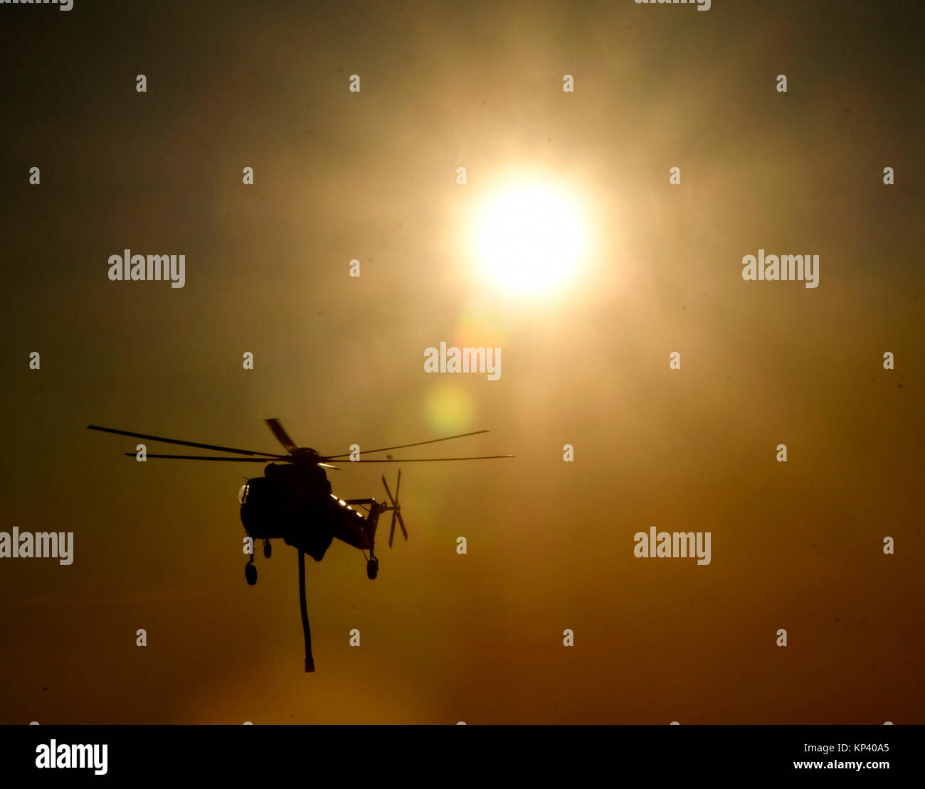 Fillmore, California, USA. 12th Dec, 2017. A fire fighting helicopter ...