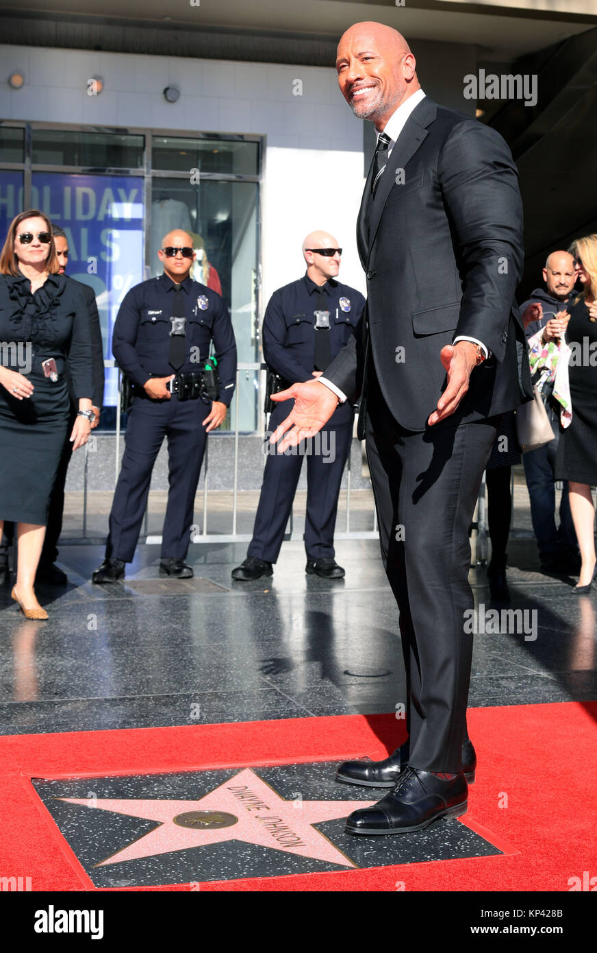 Los Angeles, USA. 13th Dec, 2017. Dwayne Johnson poses for photos at ...