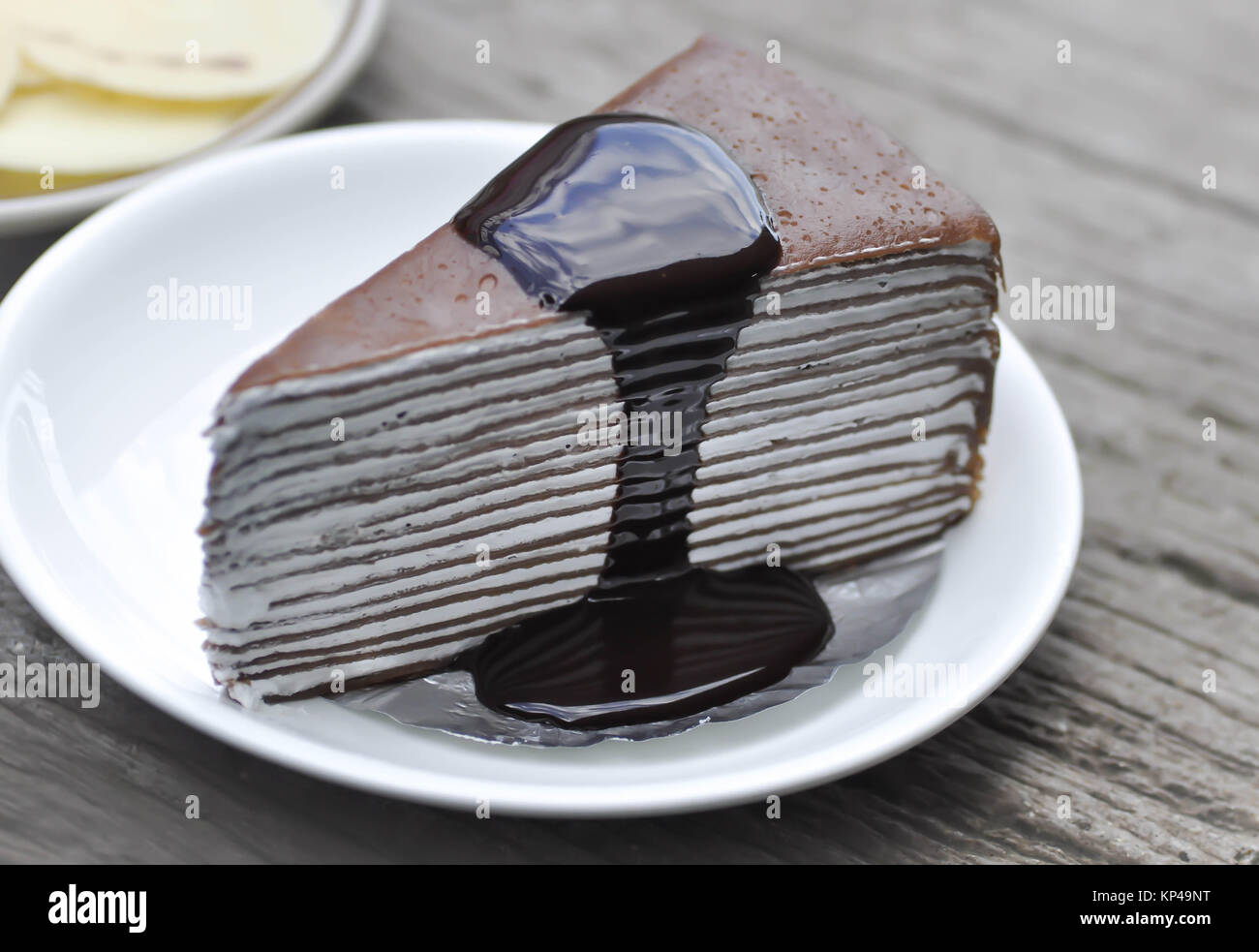 chocolate crepe cake with chocolate topping Stock Photo - Alamy