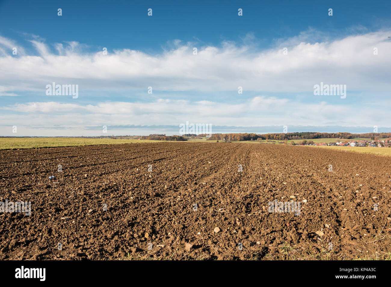Fertile fields and green and brown soil Stock Photo - Alamy