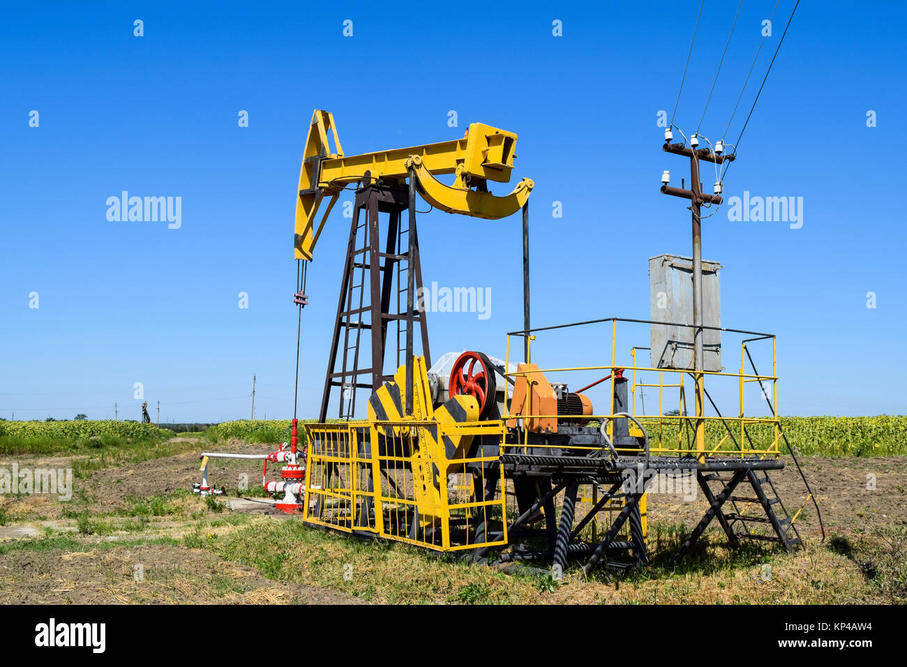 The pumping unit as the oil pump installed on a well. Equipment of oil ...