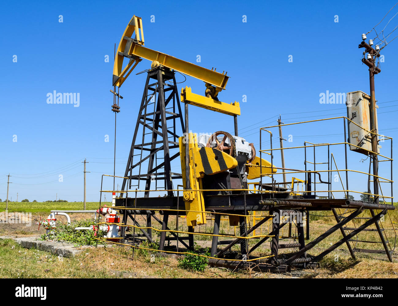 The pumping unit as the oil pump installed on a well. Equipment of oil ...