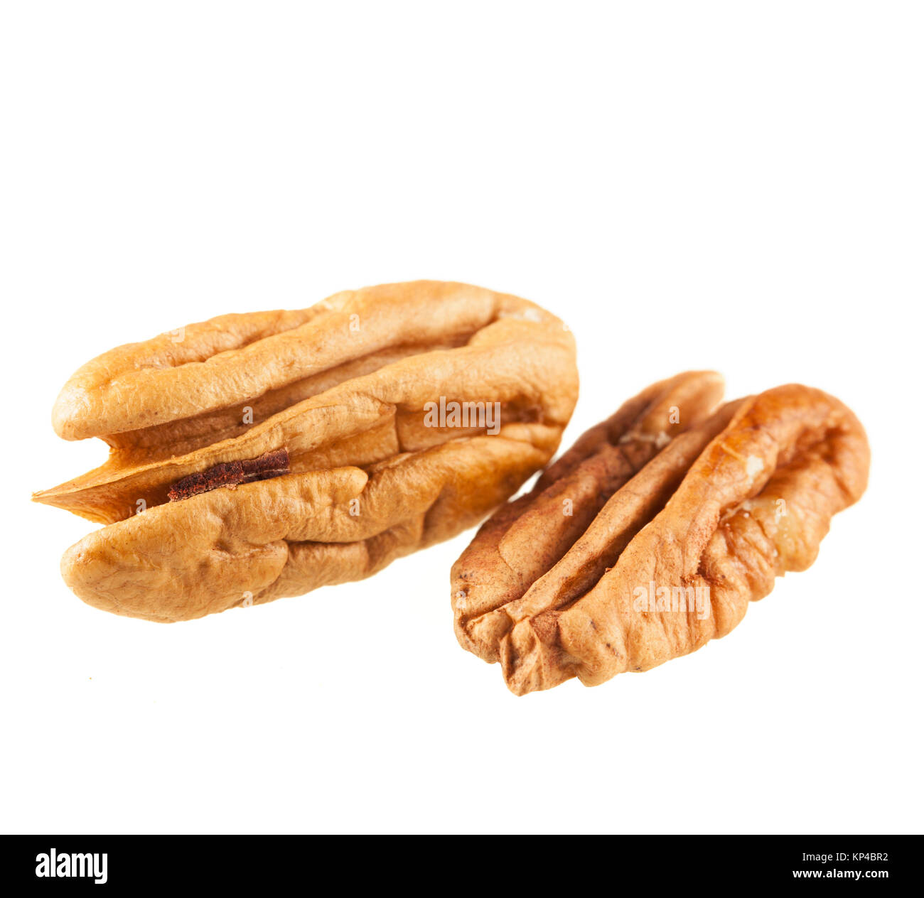 Shelled pecans isolated on white background Stock Photo - Alamy