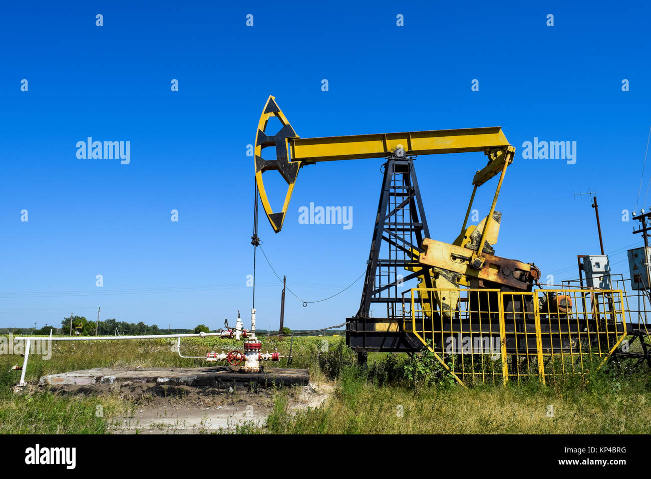 The pumping unit as the oil pump installed on a well. Equipment of oil ...
