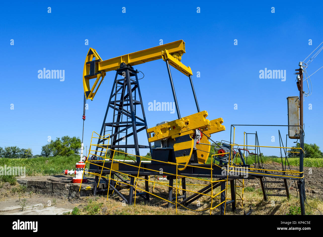 The pumping unit as the oil pump installed on a well. Equipment of oil ...