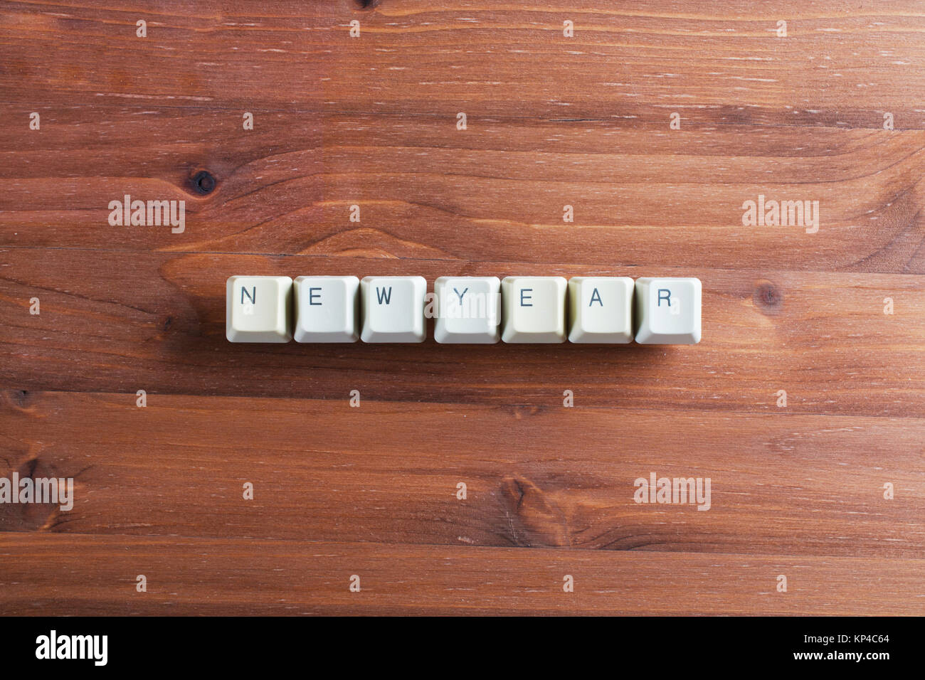 Happy new year word written using white computer keyboard keys buttons ...