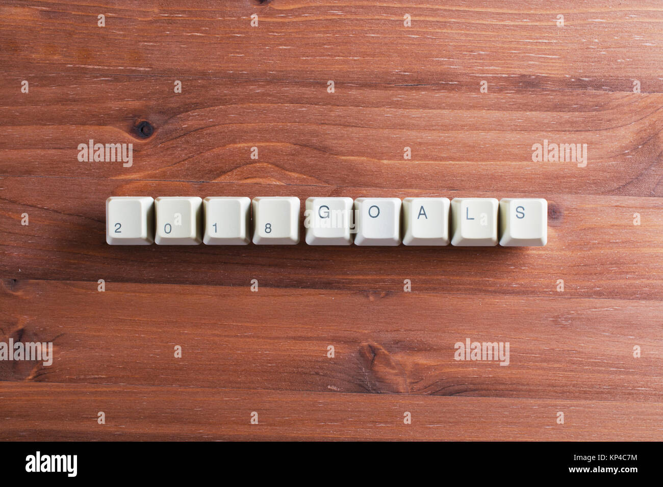 Goals for New Year 2018. Flat lay view from above on the table with computer keyboard keys ...