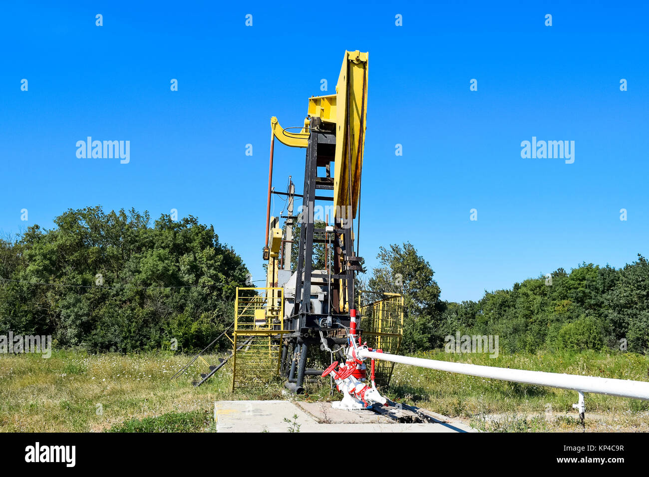 The pumping unit as the oil pump installed on a well. Equipment of oil ...