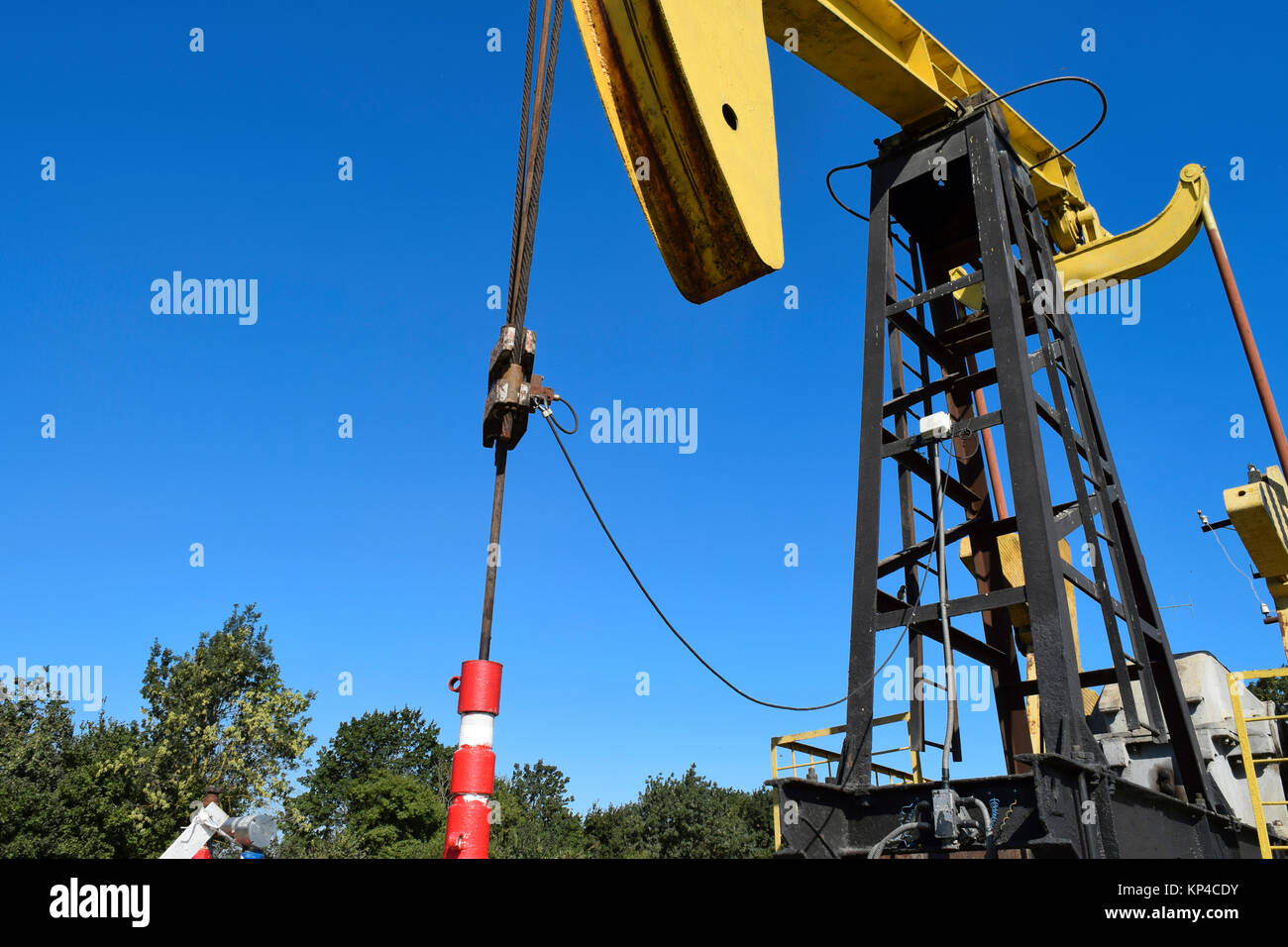 The pumping unit as the oil pump installed on a well. Equipment of oil ...