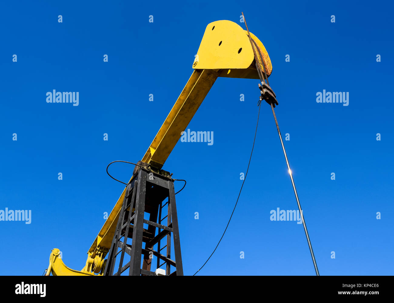 The pumping unit as the oil pump installed on a well. Equipment of oil ...