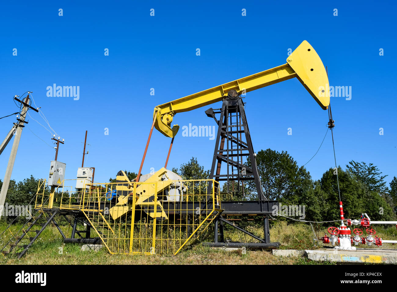 The pumping unit as the oil pump installed on a well. Equipment of oil ...