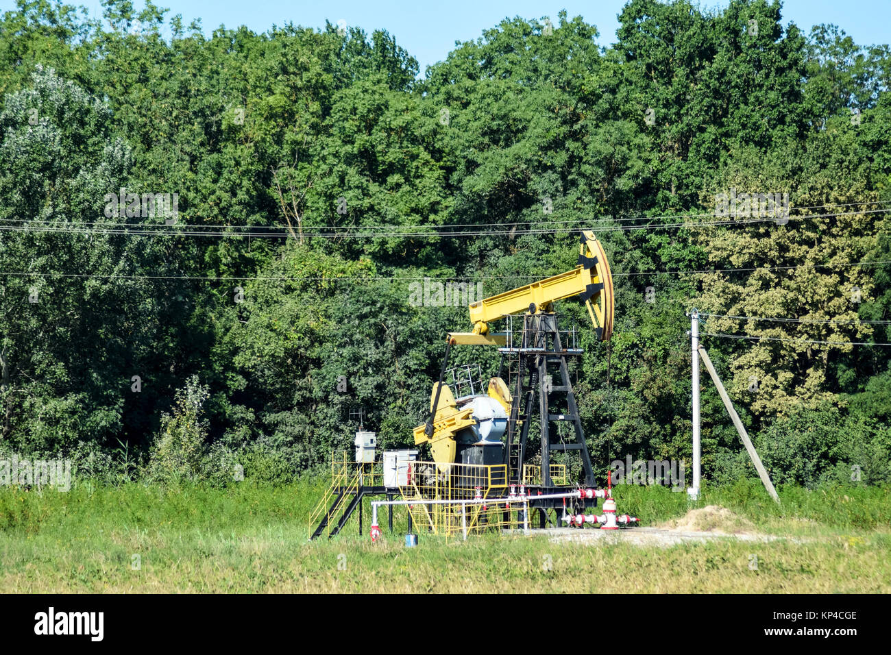 The pumping unit as the oil pump installed on a well. Equipment of oil ...