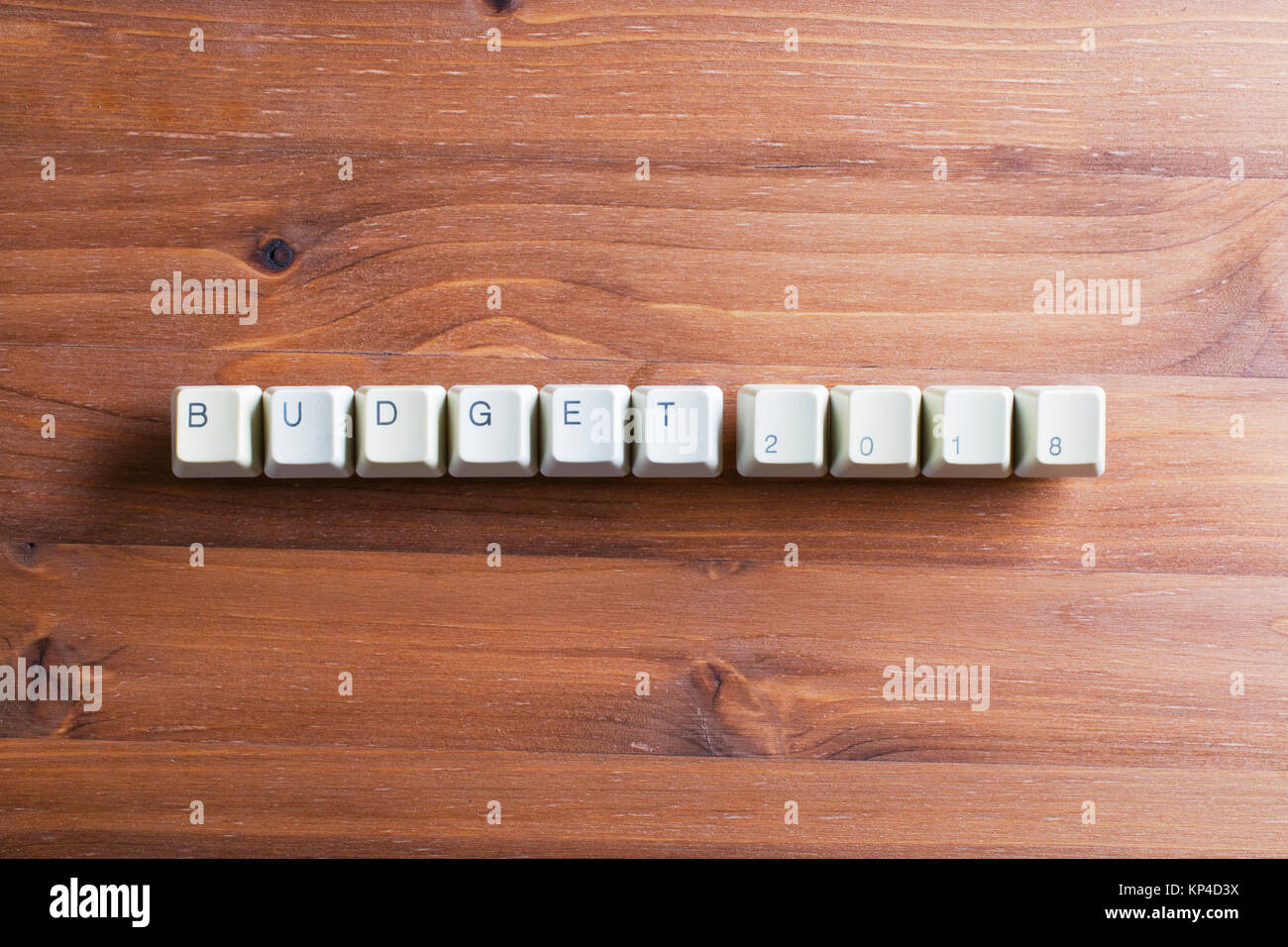 Budget 2018 new year. Flat lay view from above on the table with computer keyboard keys buttons ...