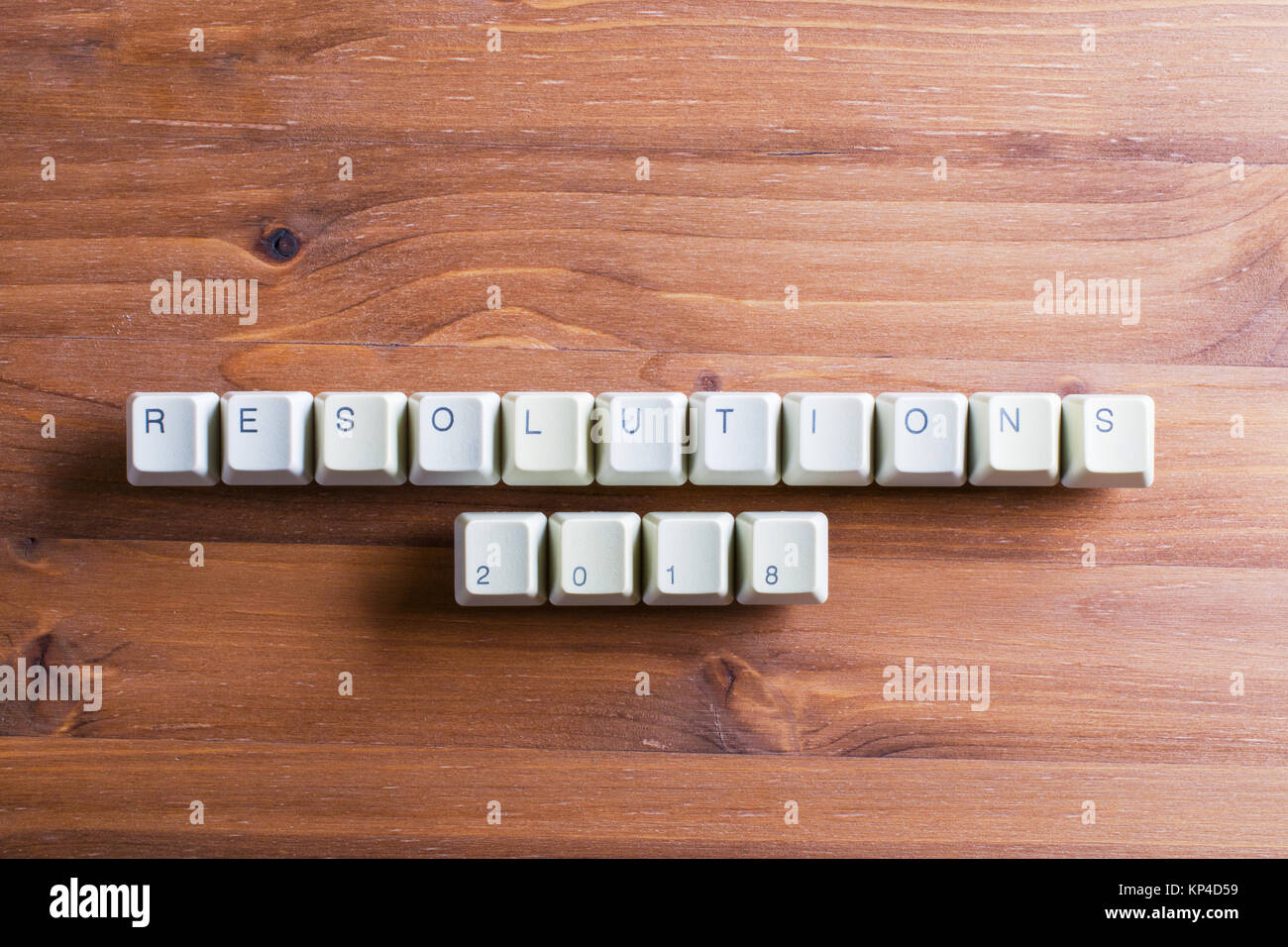 Resolutions 2018. Flat lay view from above on the table with computer keyboard keys buttons on a ...