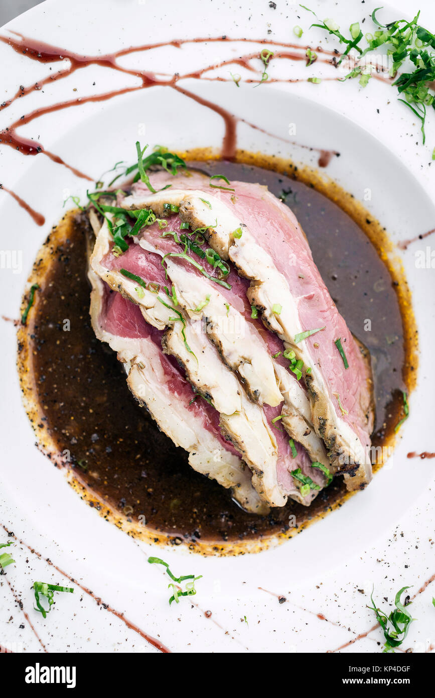 gourmet cuisine rare roast beef in traditional gravy sauce meal Stock ...