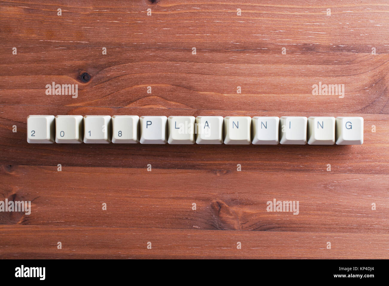 Planning 2018 new year. Flat lay view from above on the table with computer keyboard keys ...