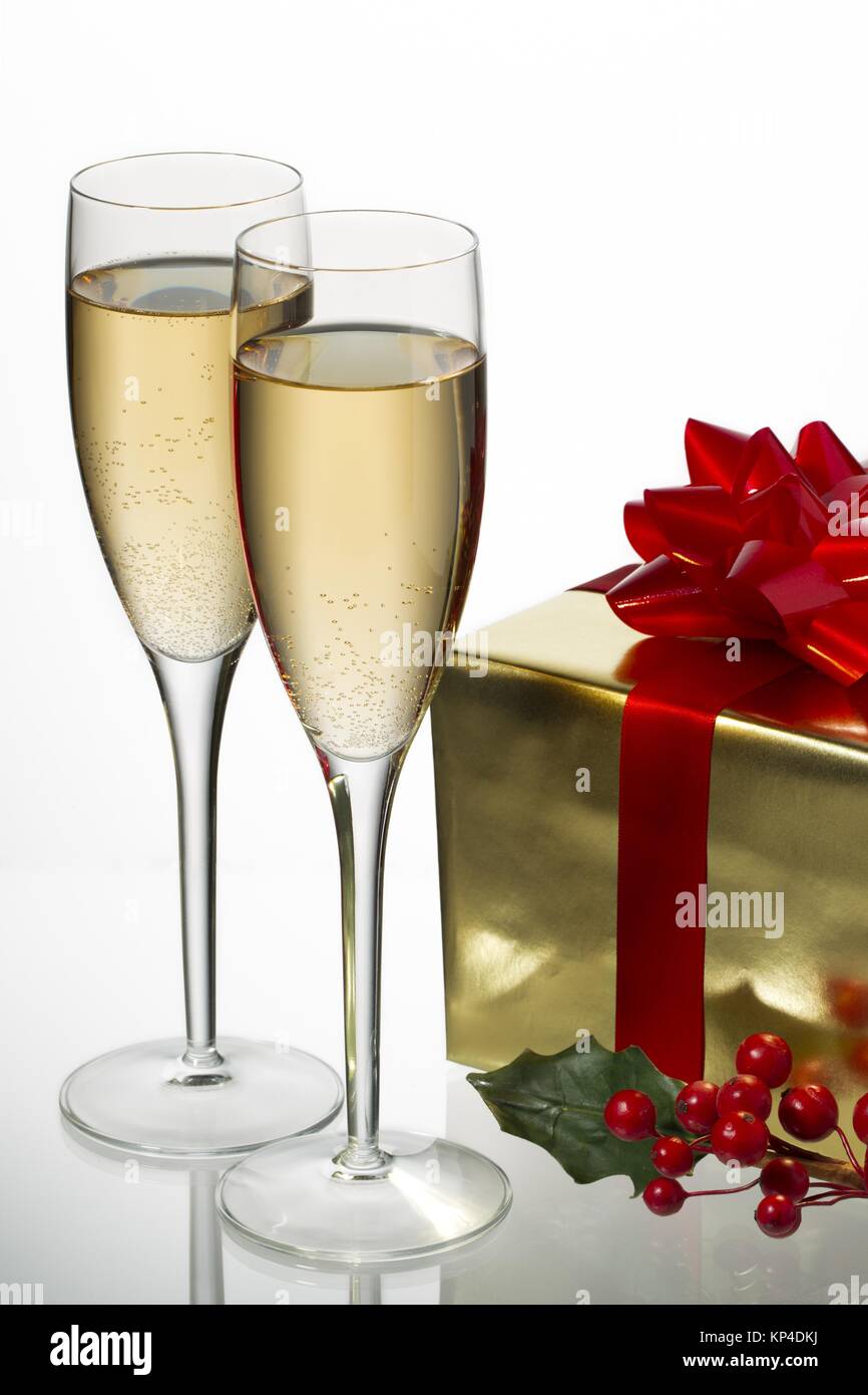 champagne and a christmas gift Stock Photo - Alamy