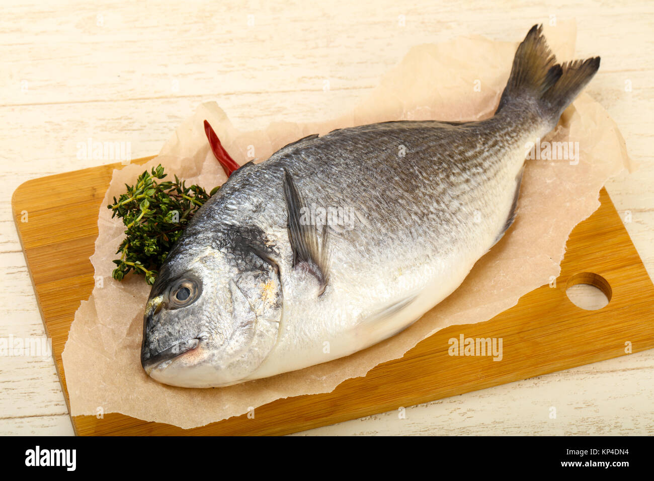 raw dorada fish - ready for cooking Stock Photo - Alamy