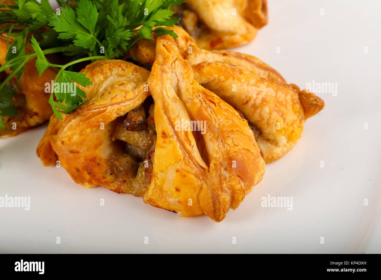 Pastry with meat served parsley Stock Photo - Alamy