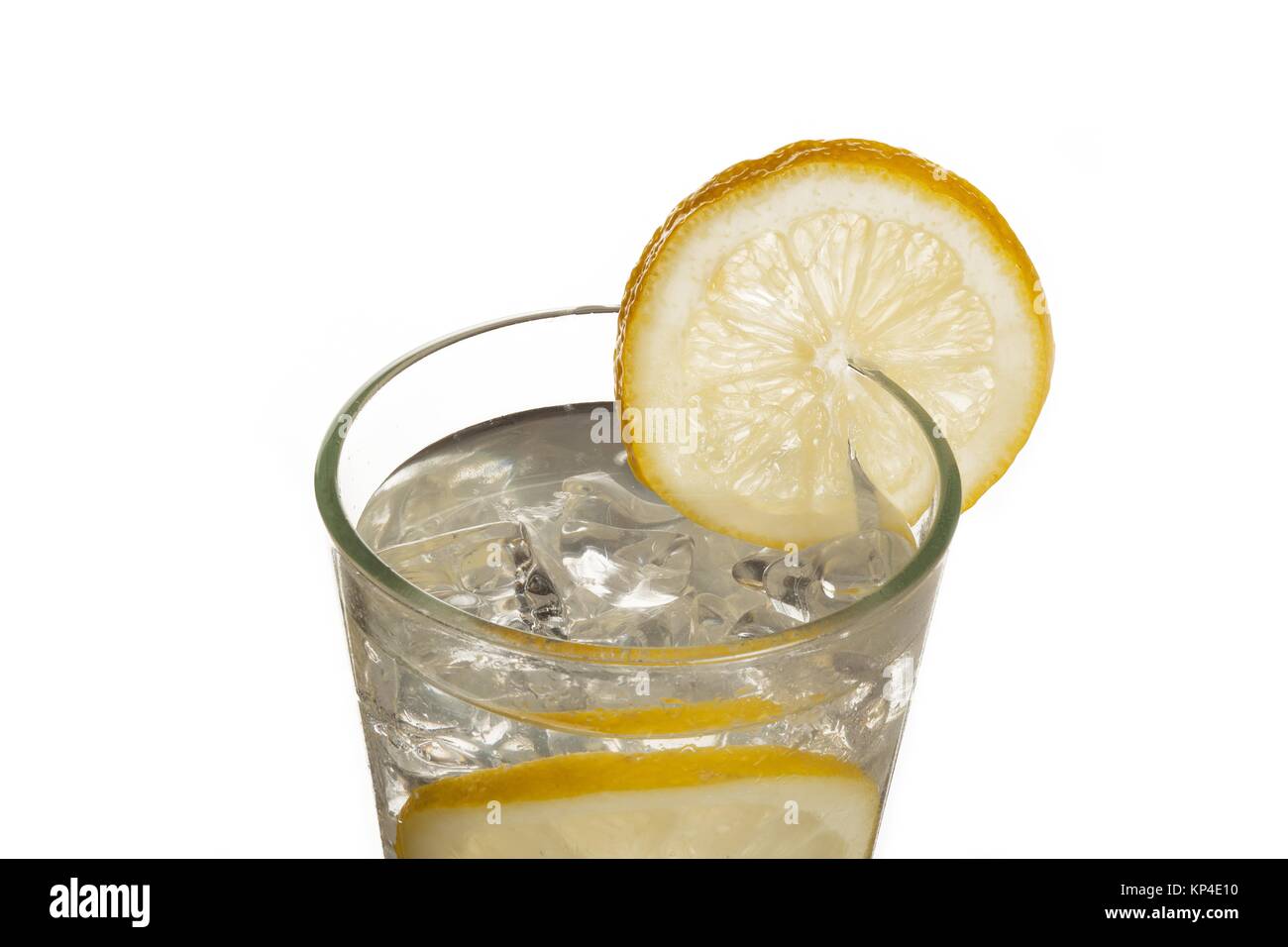 close up cropped image of a lemon juice glass with a lemon slice Stock ...