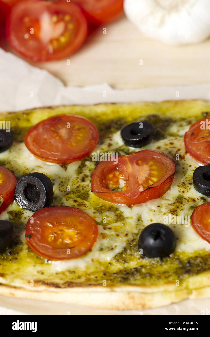 close up cropped shot of a pizza with vegetables toppings Stock Photo ...