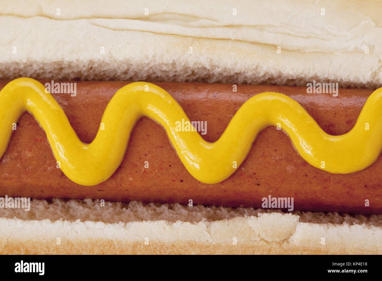 close up image hat dog sandwich with mustard Stock Photo - Alamy