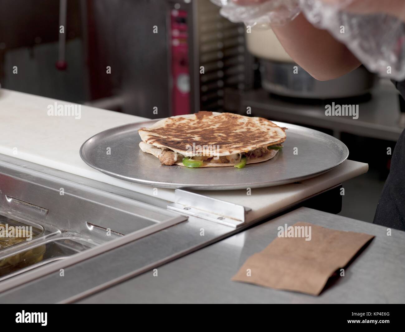 close up shot of a chef preparing burrito Stock Photo - Alamy
