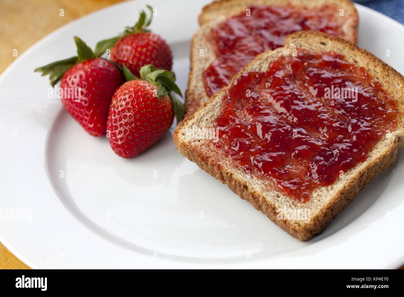 close up shot of bread and jam in plate Stock Photo - Alamy