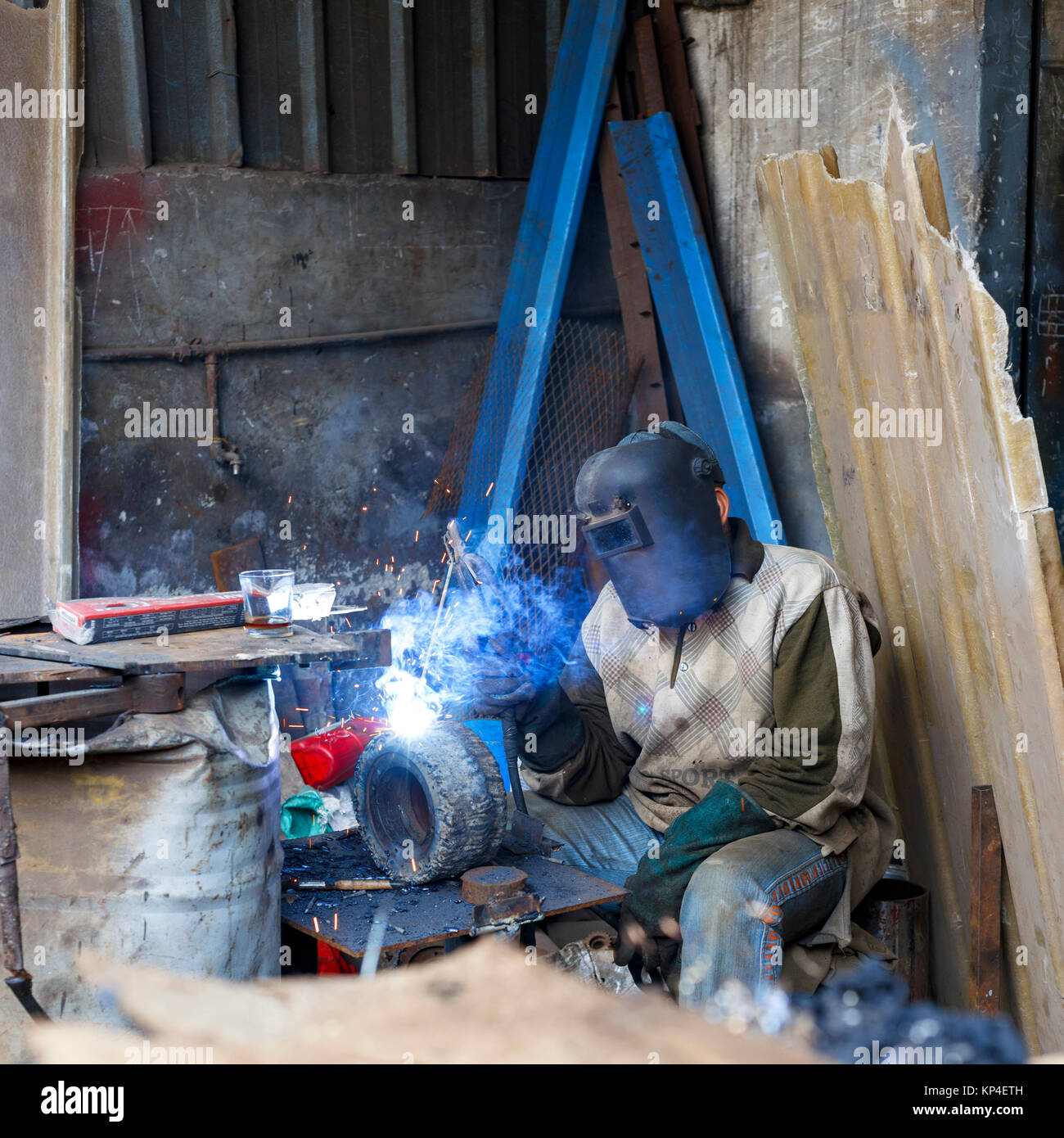 Alexandria, Egypt - March 25 ,2016: Young man welding Stock Photo - Alamy