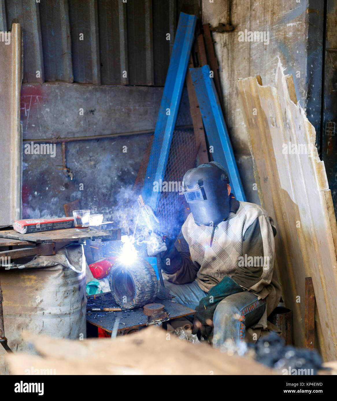 Alexandria, Egypt - March 25 ,2016: Young man welding Stock Photo - Alamy