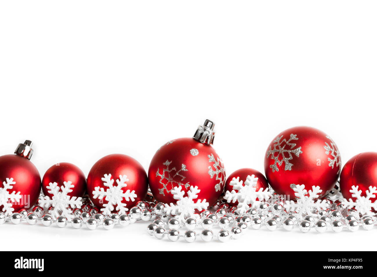red christmas balls on white. studio shot Stock Photo - Alamy