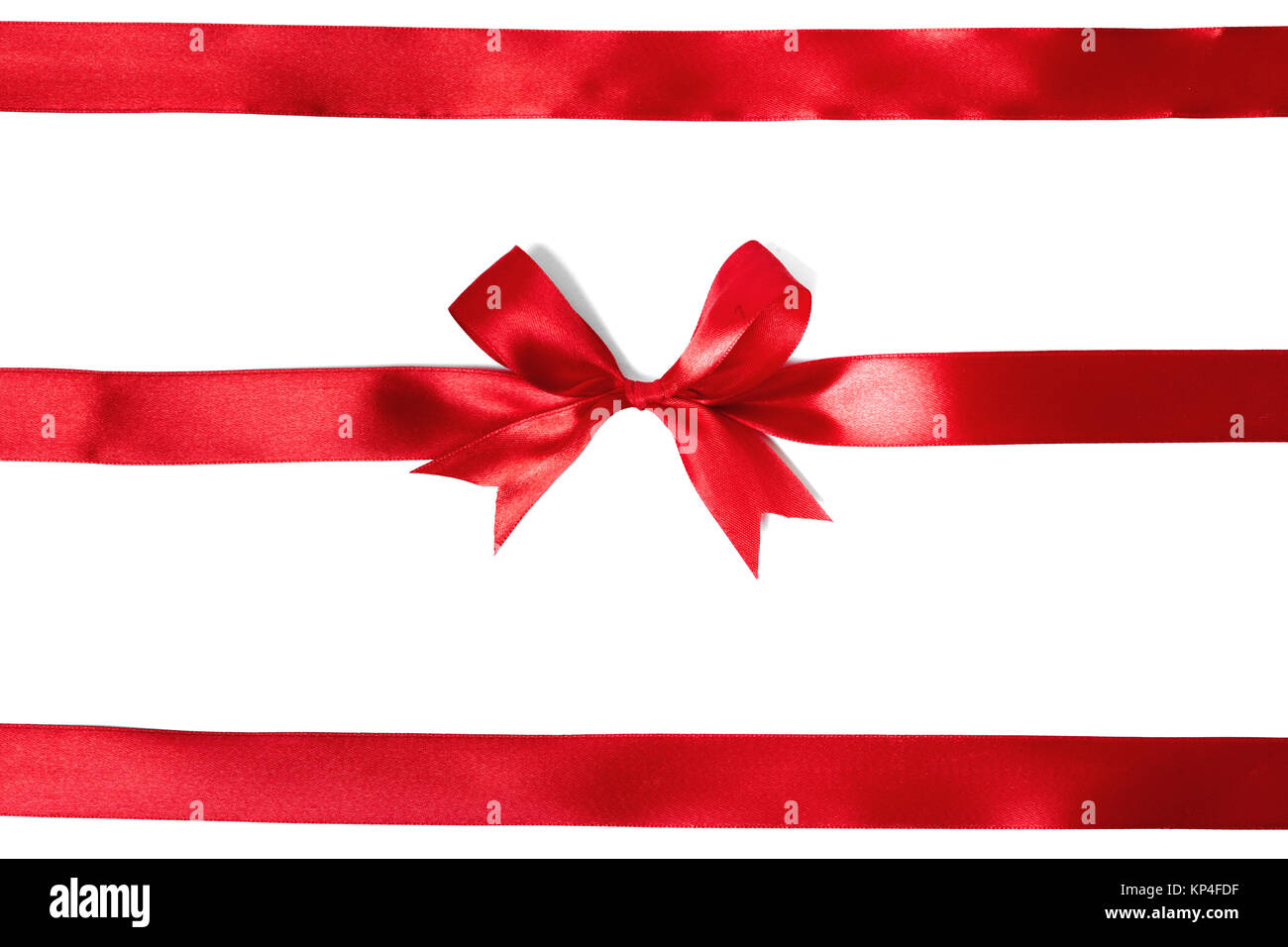 Red ribbon bow on white background. studio shot Stock Photo - Alamy