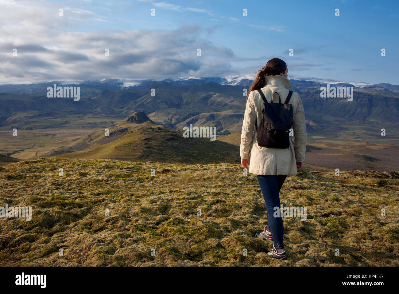 Young woman in the mountains, alone with nature Stock Photo - Alamy