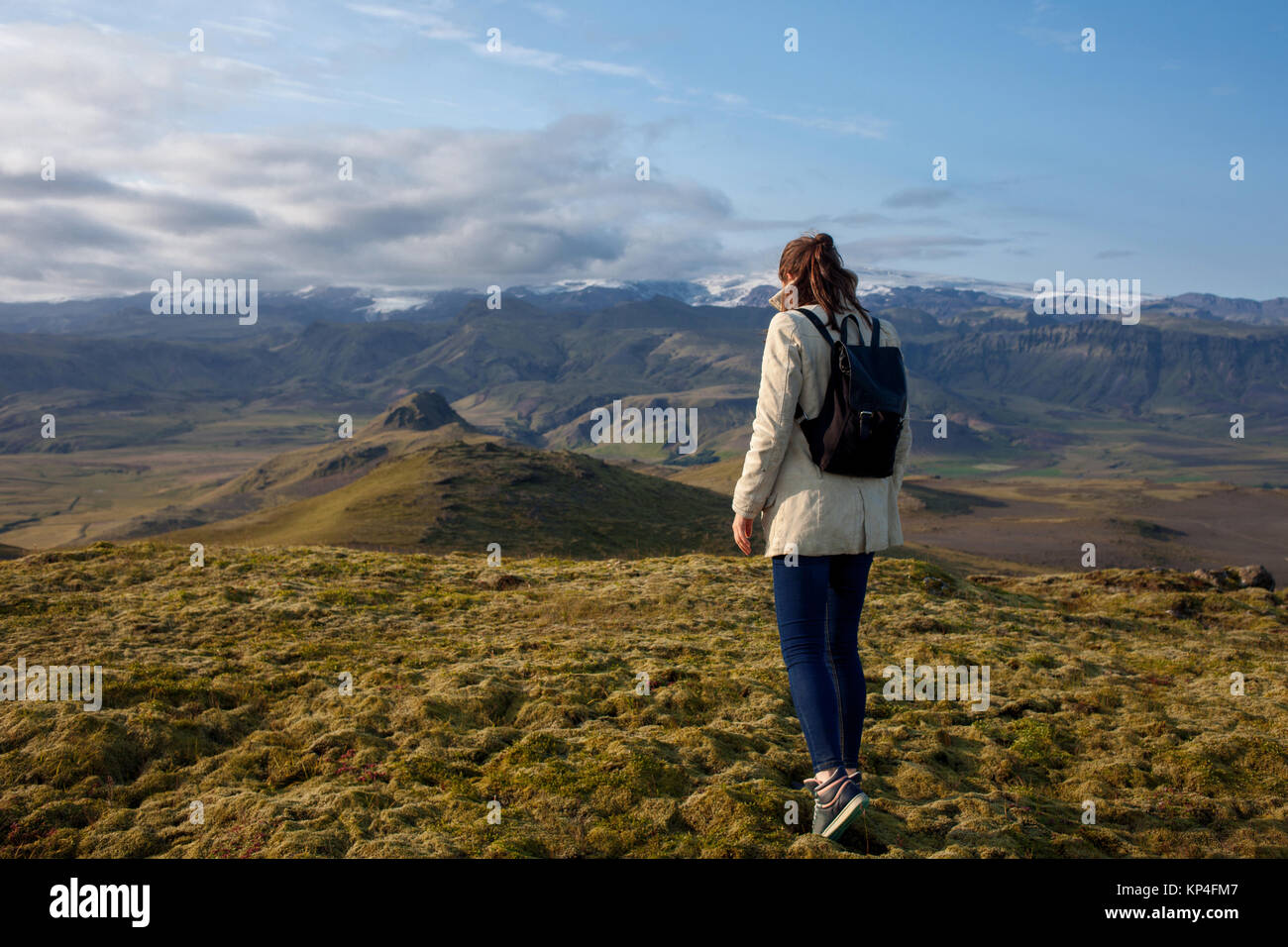Young woman in the mountains, alone with nature Stock Photo - Alamy