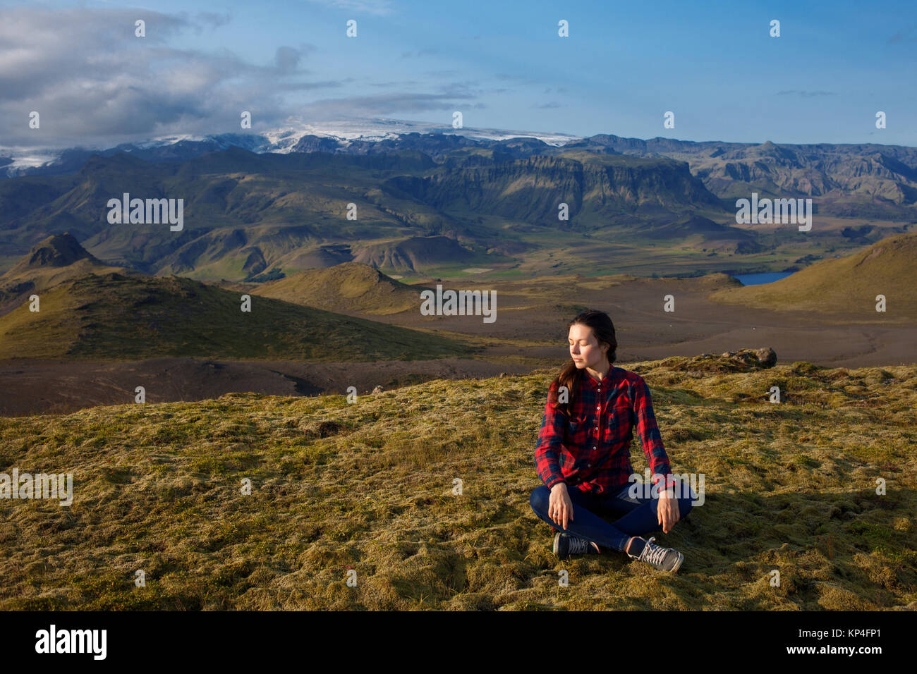 Young woman in the mountains, alone with nature Stock Photo - Alamy