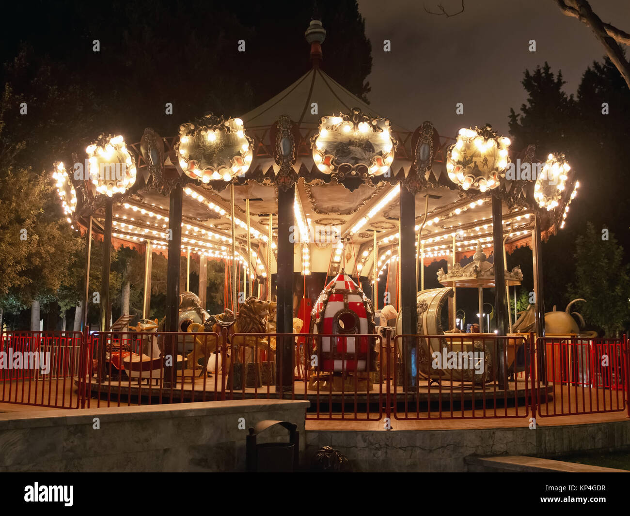 Fun fair and night . Colorful chain swing carousel in motion at ...